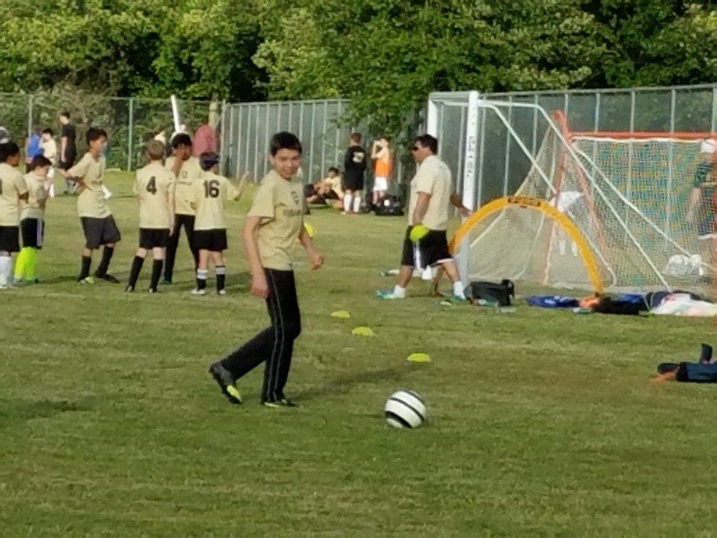 Michael and RSA Elite Soccer team doing GREAT! - Kids Playing for Kids